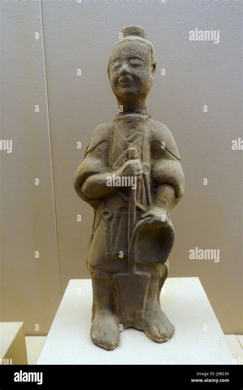 Woman With Broom And Dustpan China Unearthed At Cuiping Mountain