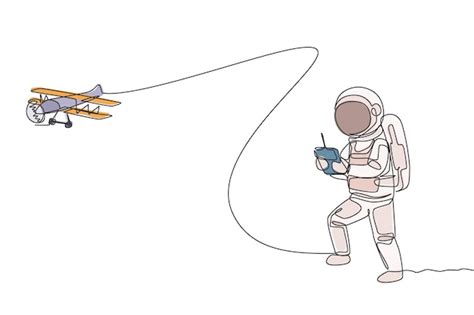 Dessin Au Trait Continu Unique Dun Astronaute Jouant à La Radiocommande Dun Avion Dans Un