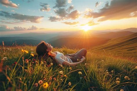 Premium Photo A Woman Laying In The Grass With Her Eyes Closed