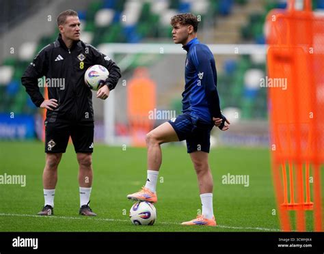 Northern Irelands Dion Charles Speaks With Coach Steven Davis Left