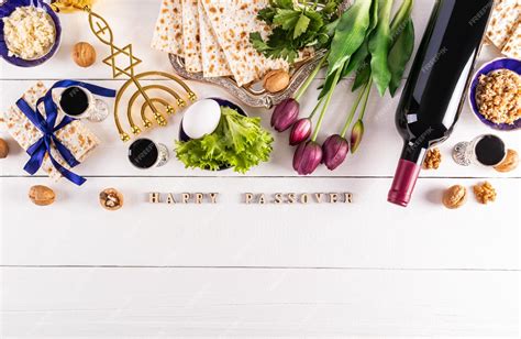 Premium Photo Festive Background For Jewish Passover Holiday With Traditional Food And Symbols