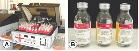 1 A Bactec Tm 460 Apparatus With Racks Containing Inoculated Vials