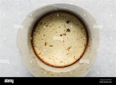 Overhead View Of Layered Cake Being Filled With Chocolate Ganache Top View Of Chocolate Filling Overhead View Of Layered Cake Being Filled With Chocolate Ganache Top View Of Chocolate Filling
