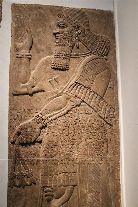 Ancient Assyrian Bas Relief Featuring A Bearded Male Figurebritish