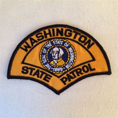 Washington State Police Logo In Yellow And Black