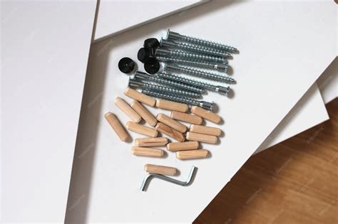 Premium Photo Details For Assembling Furniture Closeup On The Details