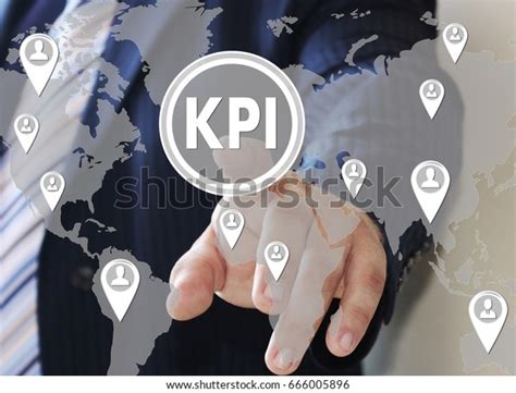 businessman clicks button kpi key performance ภาพสต็อก 666005896