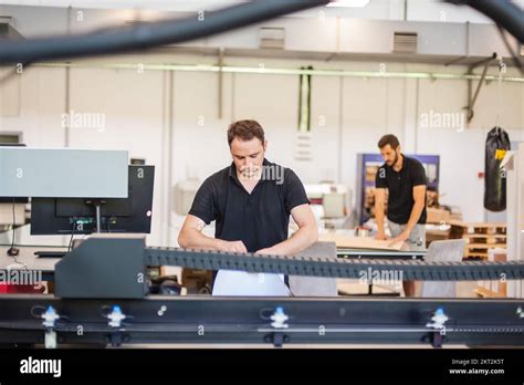 professional workers graphic technicians operators work in a printing