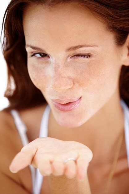 Premium Photo Woman Blow And Kiss As Portrait For Natural Beauty Wink