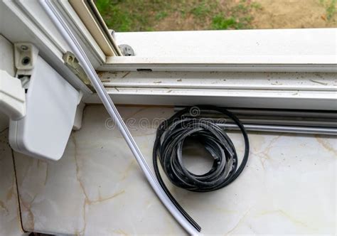 Replace Rubber Seal On Window Stock Image Image Of Human Door 256778781
