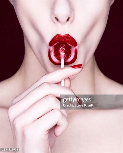 Lollipop Between Lips Photos And Premium High Res Pictures Getty Images