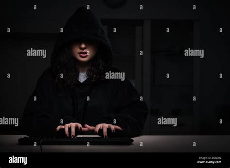 The Female Hacker Hacking Security Firewall Late In Office Stock Photo Alamy