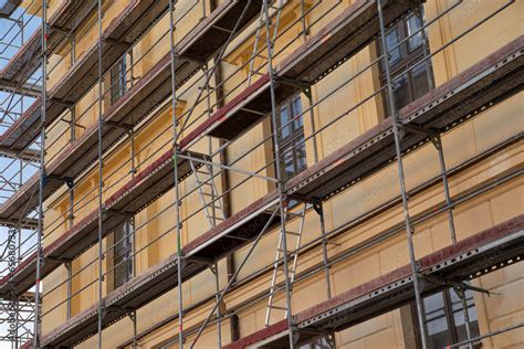 Scaffolding For Renovating Facade On The Construction Site Assembled