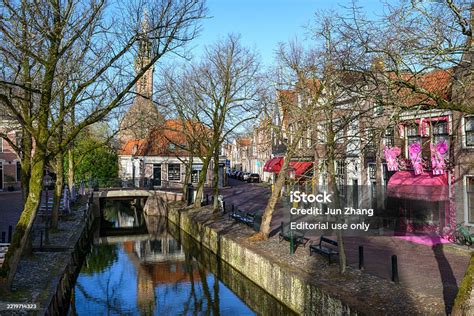 Historic Town Edam In Early Morning Tree Shadows On Brick Paved Streets