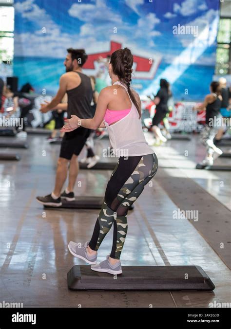 Fitness Workout In Gym People Doing Exercises In Class With Step