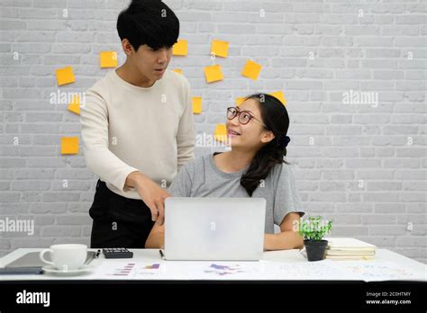 Man Woman Colleagues Discussing Ideas On Computer Startup Teamwork Coworking Team Working At