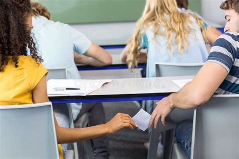 Students Passing Notes In Class Stock Image Image Of Notes Female