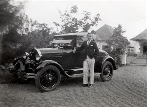 30 Amazing Photos Capture Men Posing With Their Automobiles In The