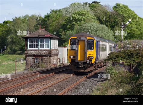 Northern Rail Class 156 Sprinter Train At Arnside With The Signal Box