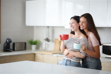 Funny Interracial Lesbian Couple Drinking And Looking Away Stock Image Image Of Future Lgbt