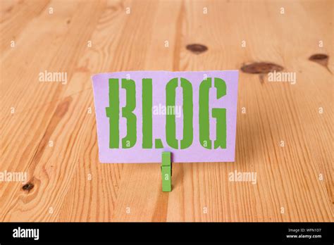 Writing Note Showing Blogquestion Business Concept For Regularly Updated Website Web Page Run