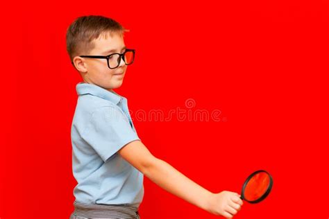 Side View Beautiful European Young Boy With Eye Glasses Holding And