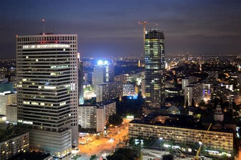 Premium Photo Warsaw City Centre At Night With Illuminated Buildings