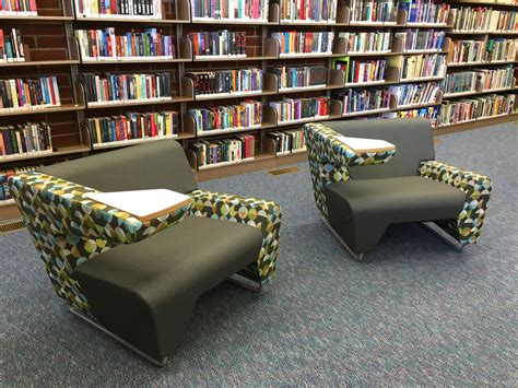 Comfort Convenience And A Pop Of Color Library Shelves High