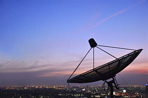A satellite dish in twilight scene | Global Trade Review (GTR)