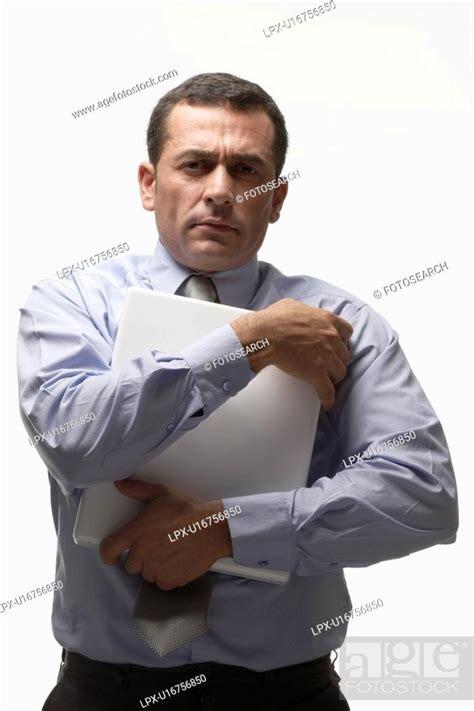 Man Holding Laptop Computer Stock Photo Picture And Royalty Free Image Pic LPX U