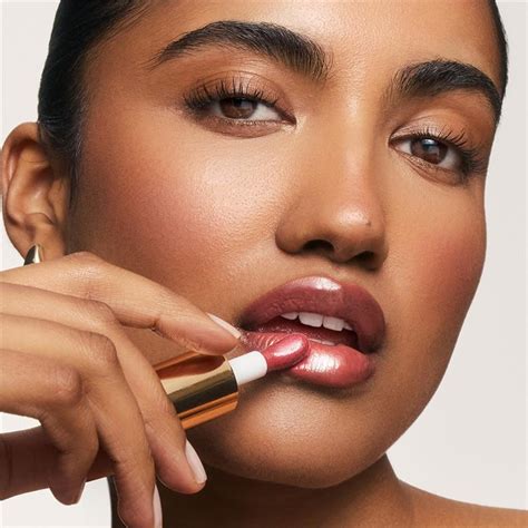 Buy Nude By Nature Nourishing And Plumping Tinted Lip Oil Pink Raspberry