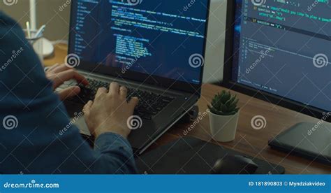 Closeup Coding On Screen Man Hands Coding Html And Programming On Two Screen Monitors