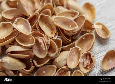 pistachio nut shells closeup sorting garbage and kitchen scraps