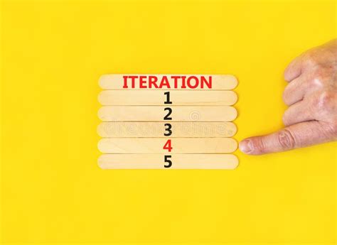 Time To Iteration 4 Symbol Concept Word Iteration 1 2 3 4 5 On Wooden Sticks Businessman Hand