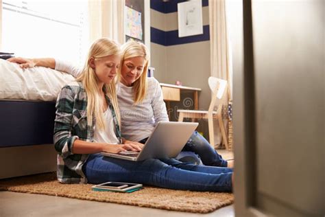 Mother And Daughter Using Laptop Computer Together Stock Image Image