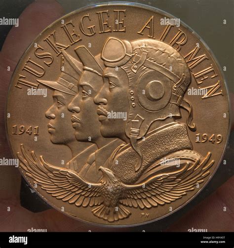 This Photo Shows Colonel Charles Edward Mcgee A Tuskegee Airman Alongside A Plaque