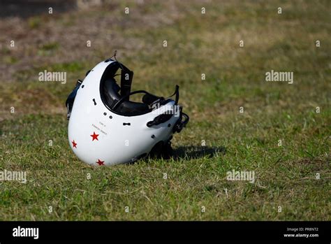 Pilots Helmet Sitting Laying On The Ground Before Or After A Flight Flying Helmet In