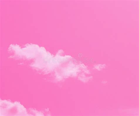Solo Colour Sky Looking Pink With Cotton Candy Like Clouds Set In A Pink Colour Background