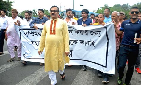 State Sports Minister Aroop Biswaser With Tmc Activists Hold Candle