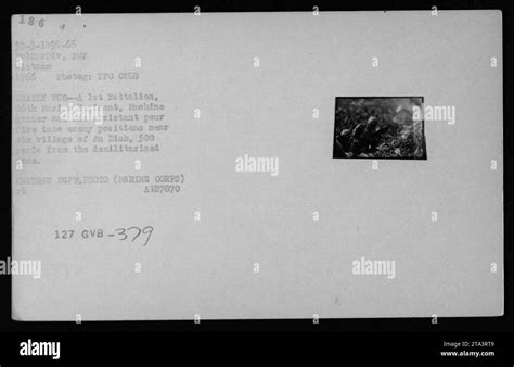 In 1966 A Us Marine Machine Gunner And His Assistant Laid Suppressing