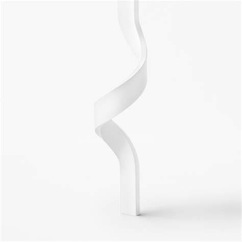 Nendo S Tangle Side Tables Twine Together As If Holding Hands