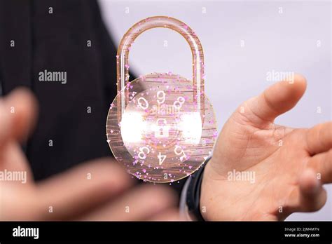 a person s finger touching a 3d rendered security concept with floating padlock and binary code