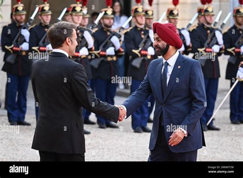 French President Emmanuel Macron And His Wife Brigitte Macron Greet