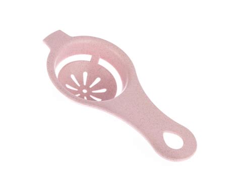 Premium Photo Egg Separator Spoon Plastic Isolated On White Background