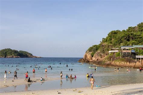 Tourists Emjoy The Beautiful View Of The Beach At Redang Island