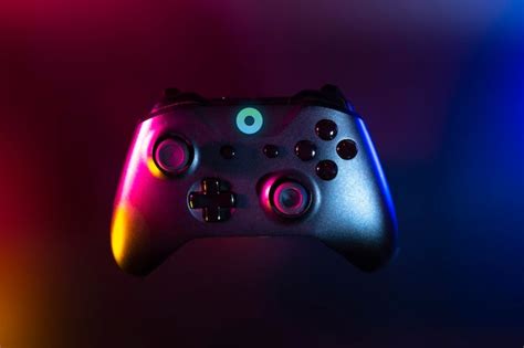 premium photo gamer playing the online game with joystick controller
