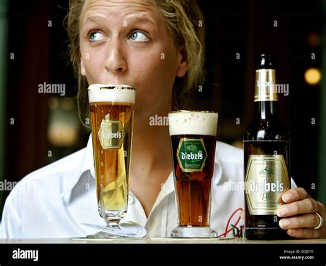 Dpa Waitress Steffi Has A Taste Of The New Pilsener Beer From The