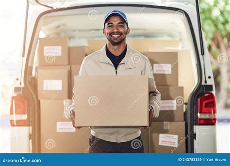 Stopping Off For Another Delivery Portrait Of A Delivery Man Unloading