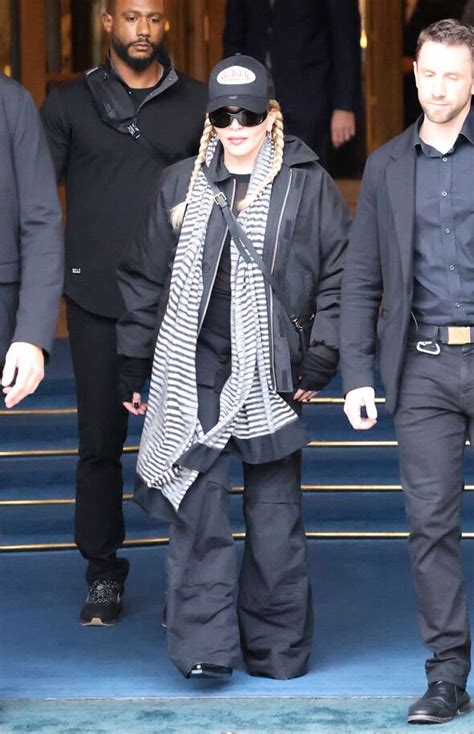 Madonna Goes Covert In Long Scarf And Shades As Shes Flanked By