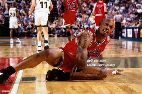 Dennis Rodman Of The Chicago Bulls Hits The Floor In Game Five Of The